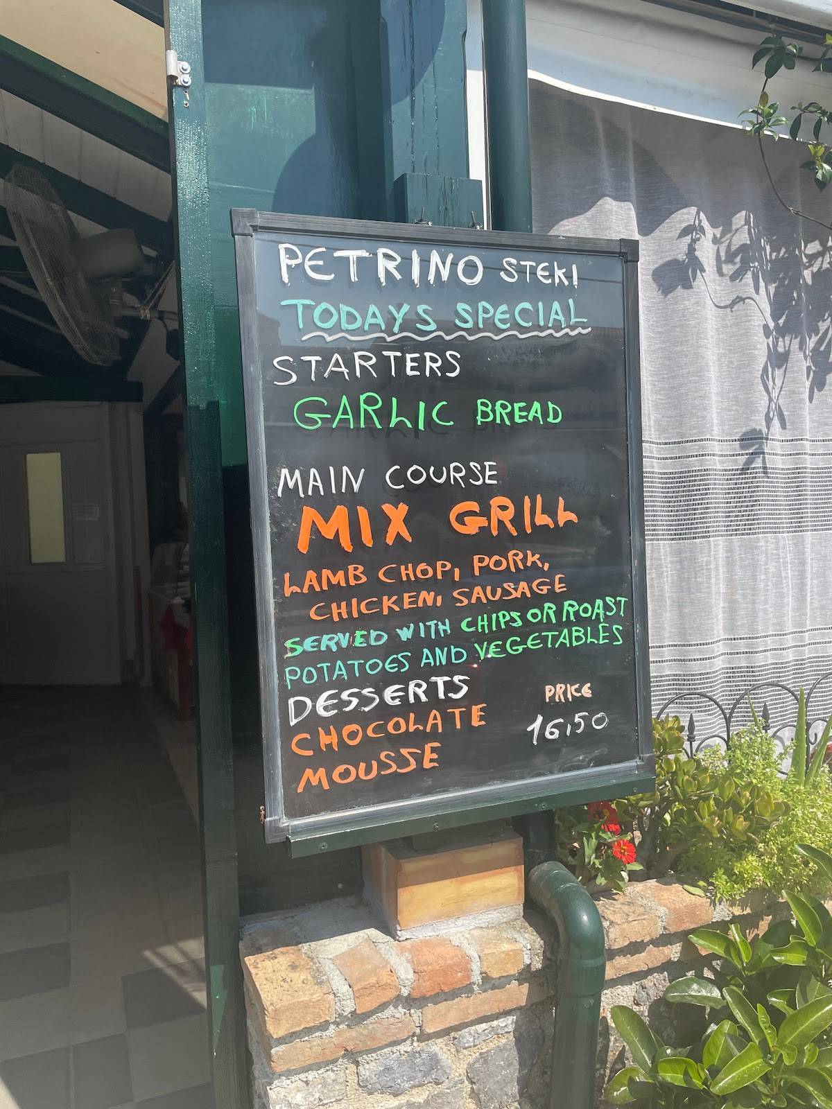 Menu at Petrino Steki, Roda, Main Street