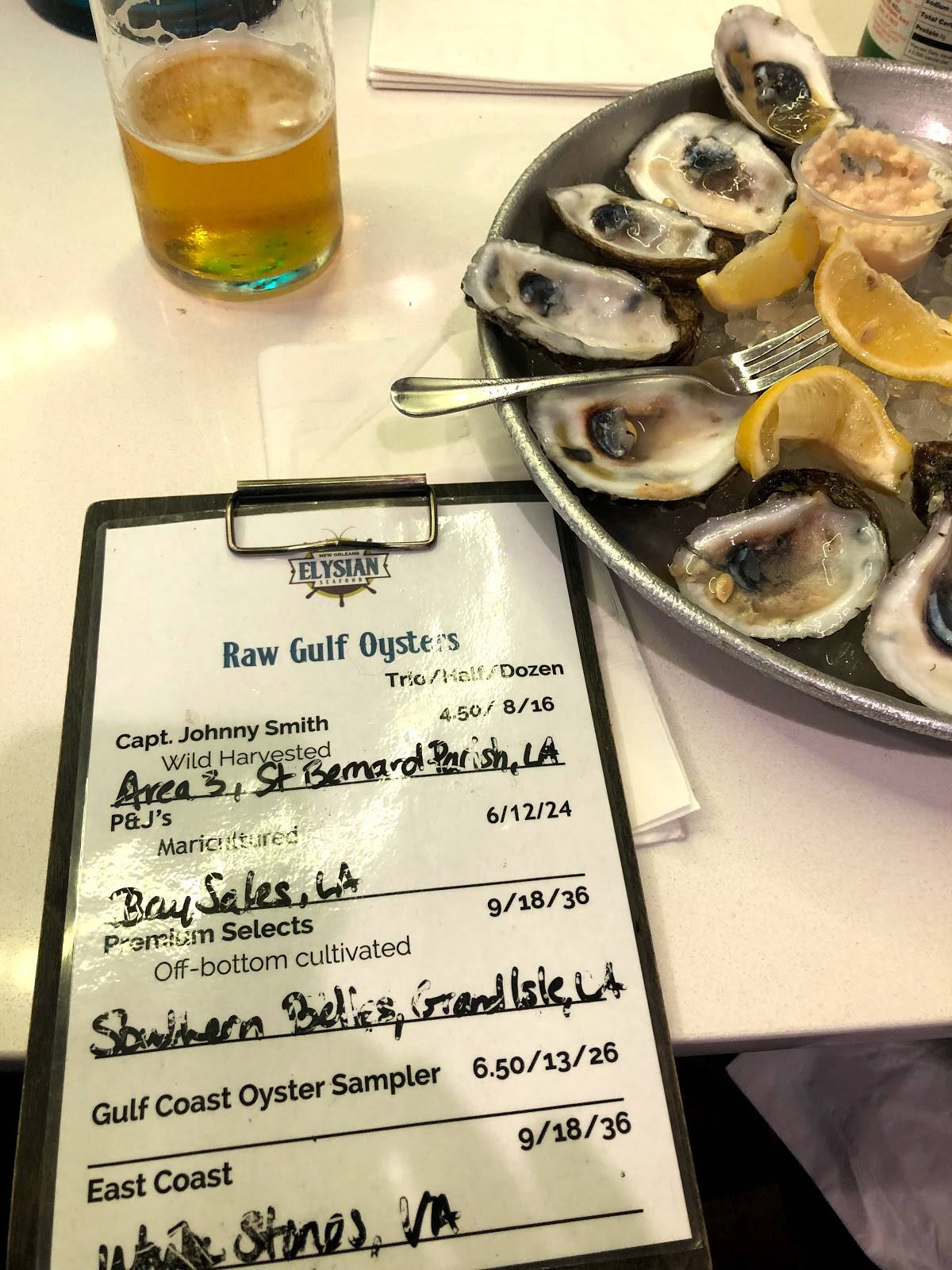 Menu at Elysian Seafood restaurant, New Orleans, at Auction House Market
