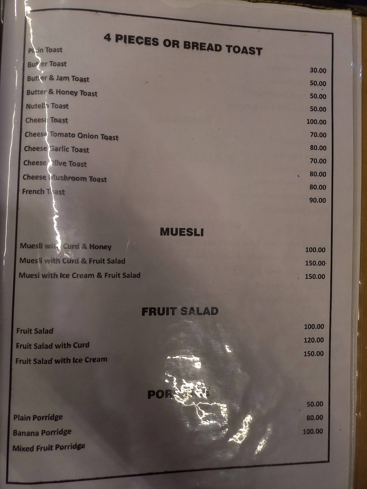 Menu at The Enigma Cafe, Pushkar