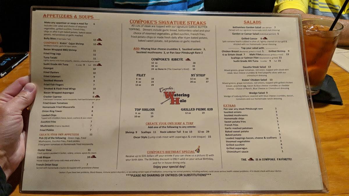 Menu at Cowpoke's Watering Hole steakhouse, Sebring, US Hwy 27 S