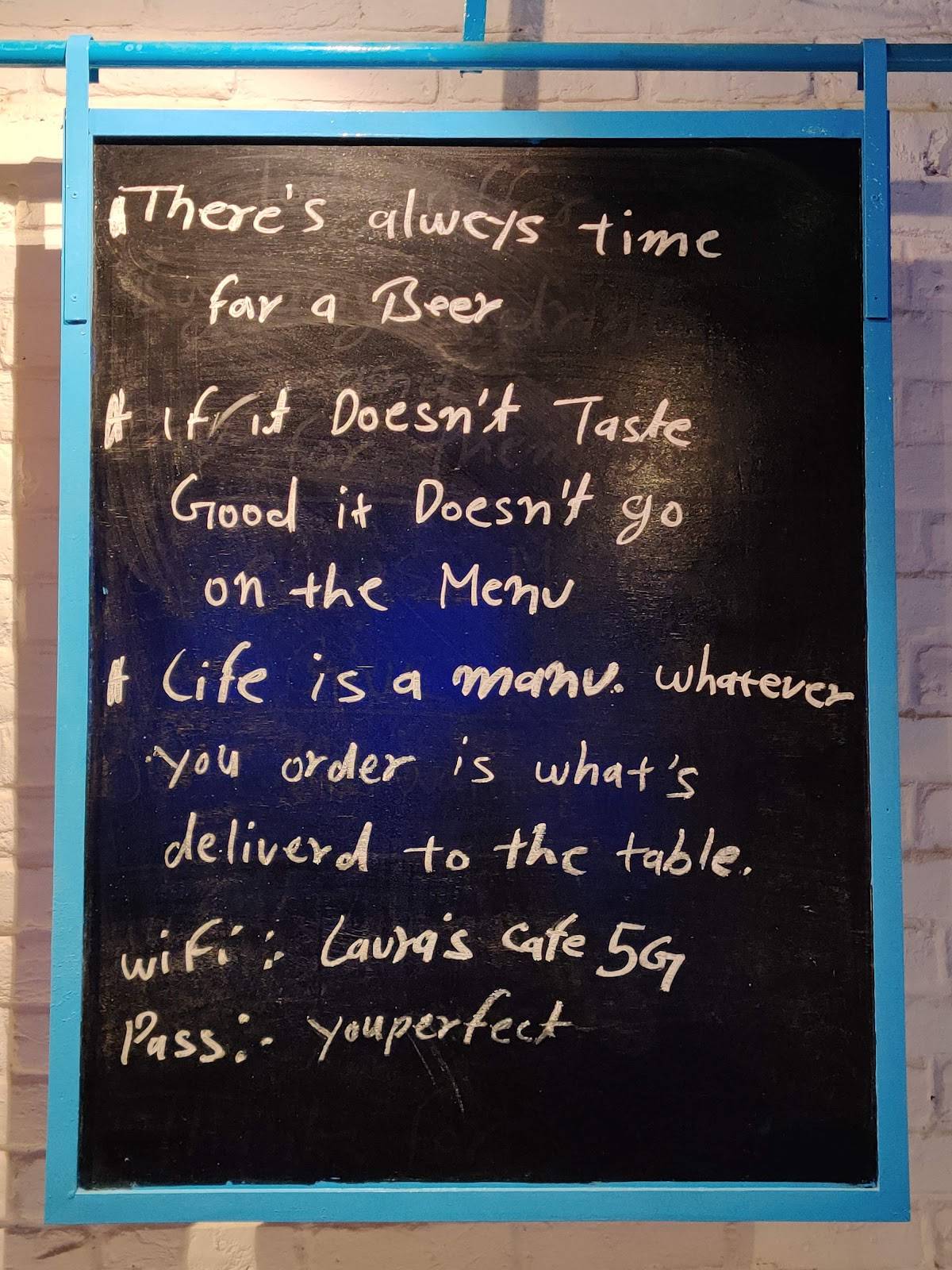 Menu at Laura's Café, Pushkar, opposite Jhulelaal ghat